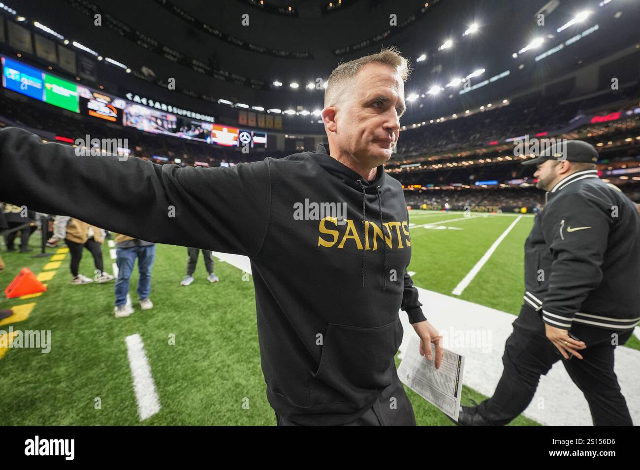 New Orleans Saints interim head coach Darren Rizzi walks on the field ...