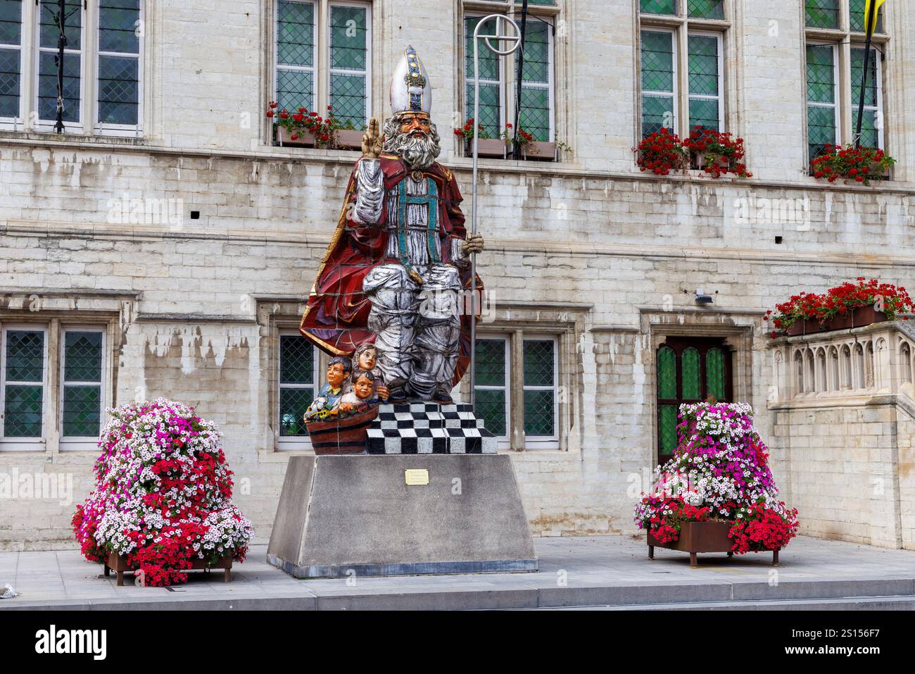 Painted statue of Saint Nicholas, Sinterklaas, in front of the town hall, Sint-Niklaas, Waasland ...