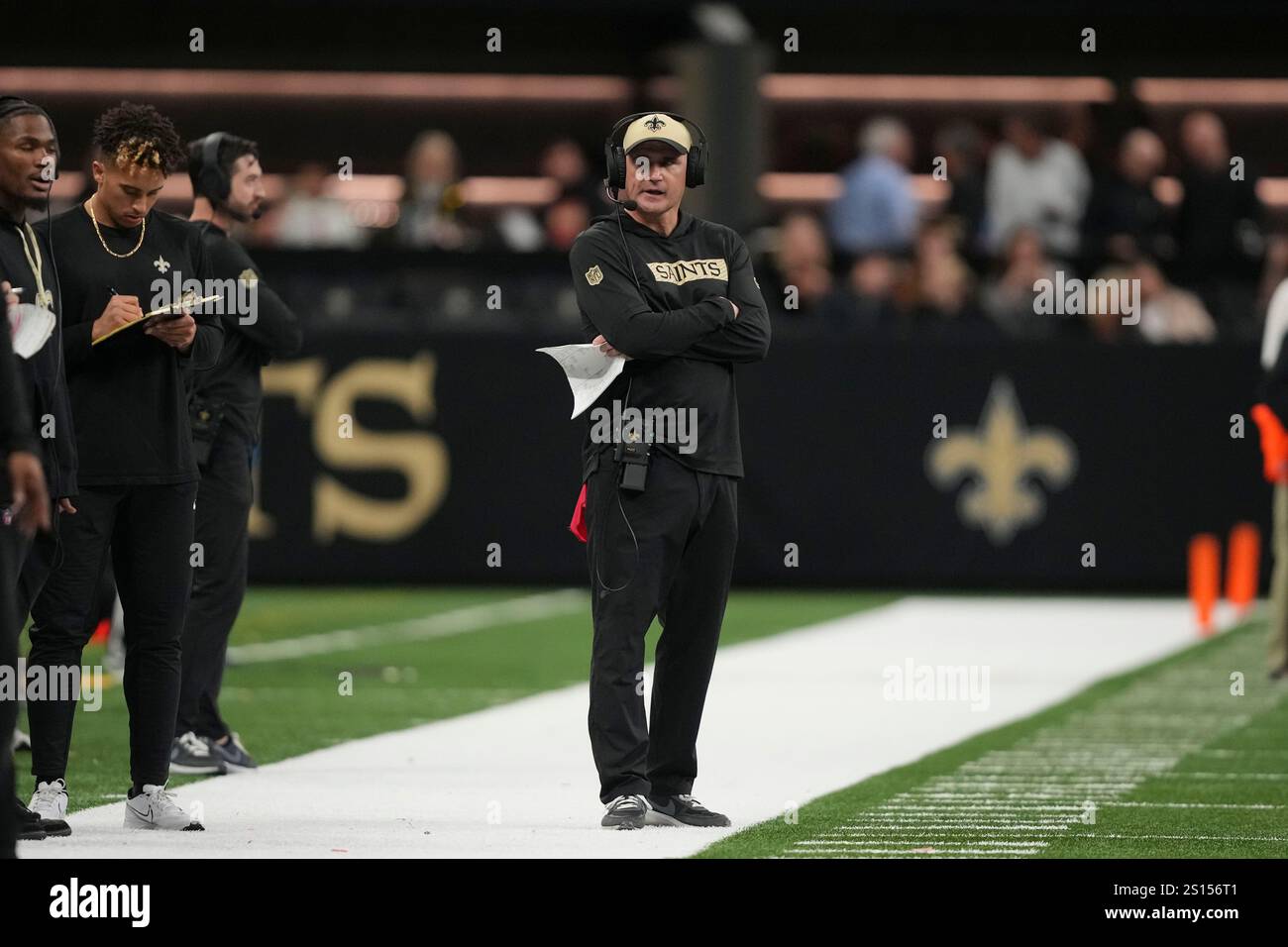 New Orleans Saints interim head coach Darren Rizzi watches from the ...