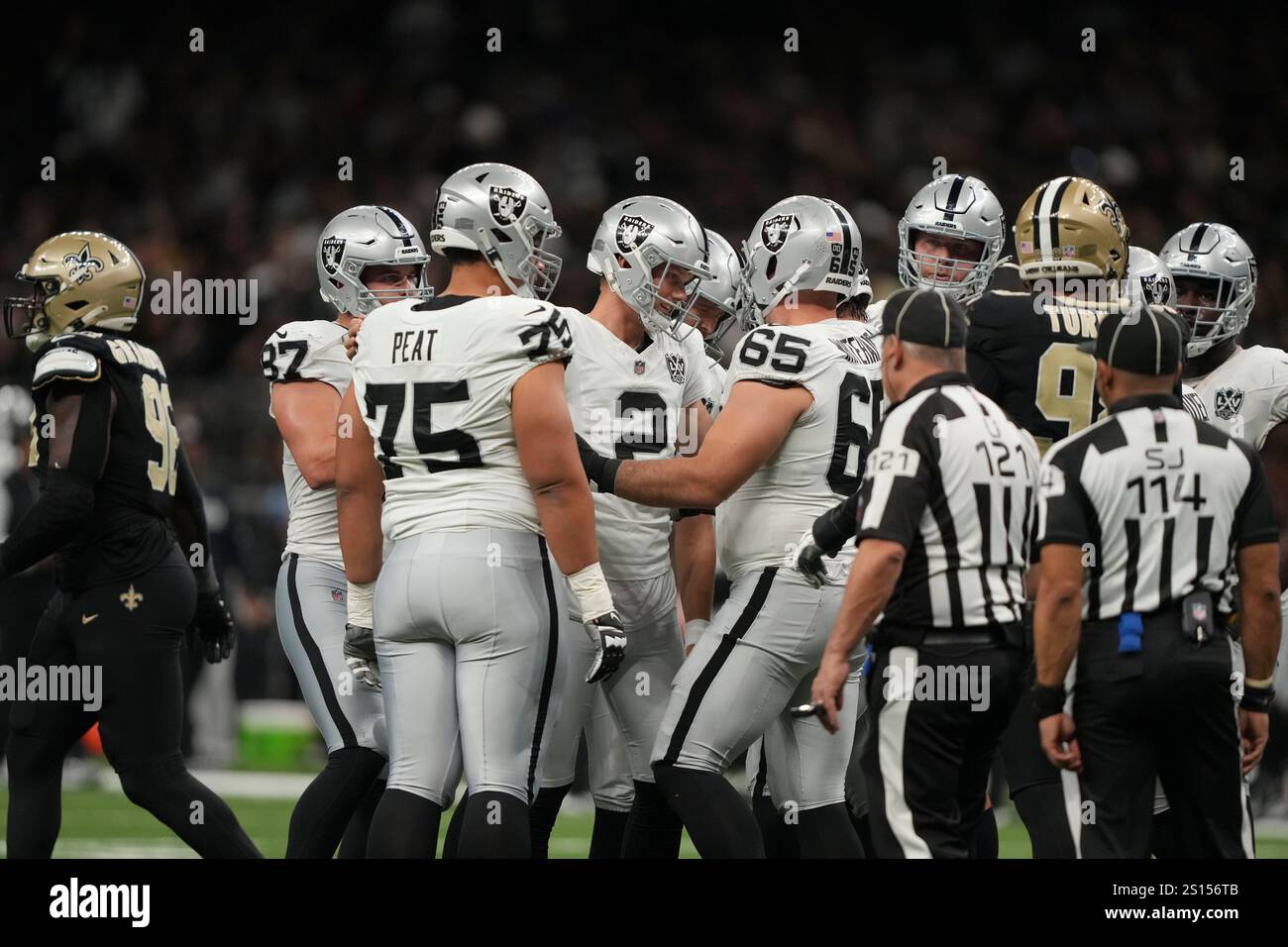 Las Vegas Raiders place kicker Daniel Carlson (2) is congratulated ...