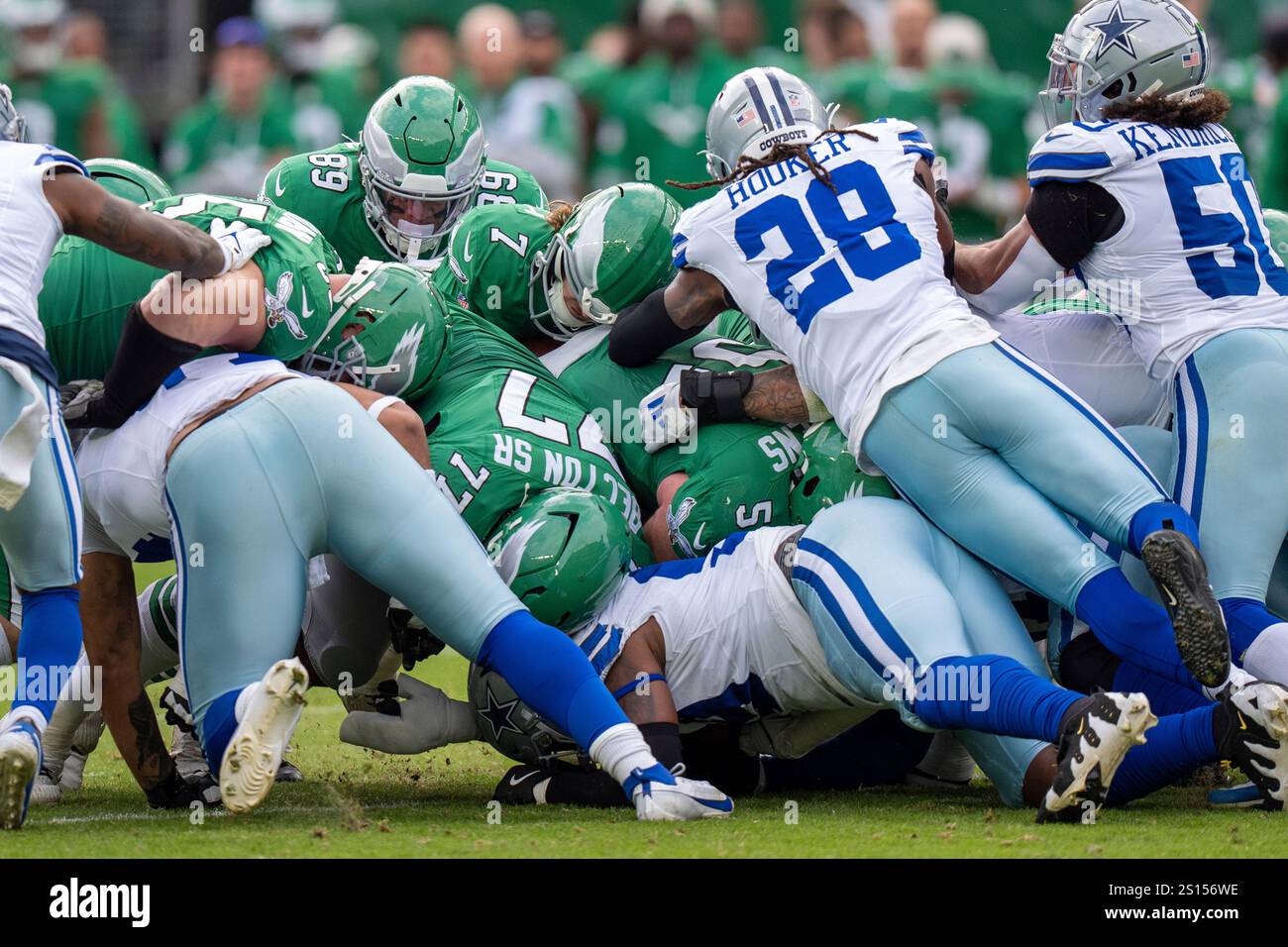 Philadelphia Eagle quarterback Kenny Pickett (7) runs the tush push ...