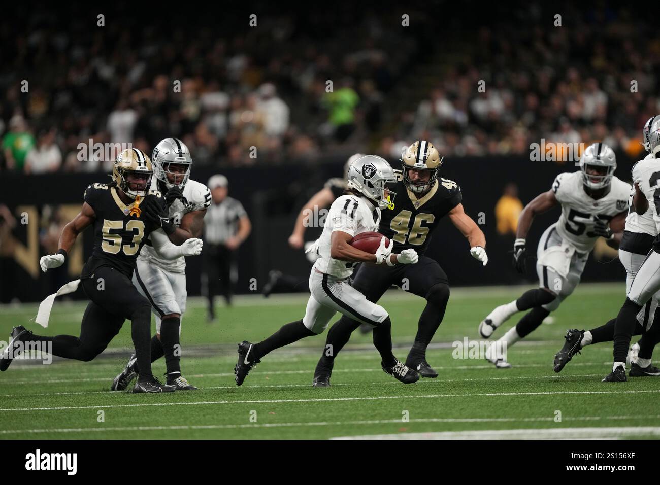 Las Vegas Raiders Tre Tucker (11) carries against New Orleans Saints ...
