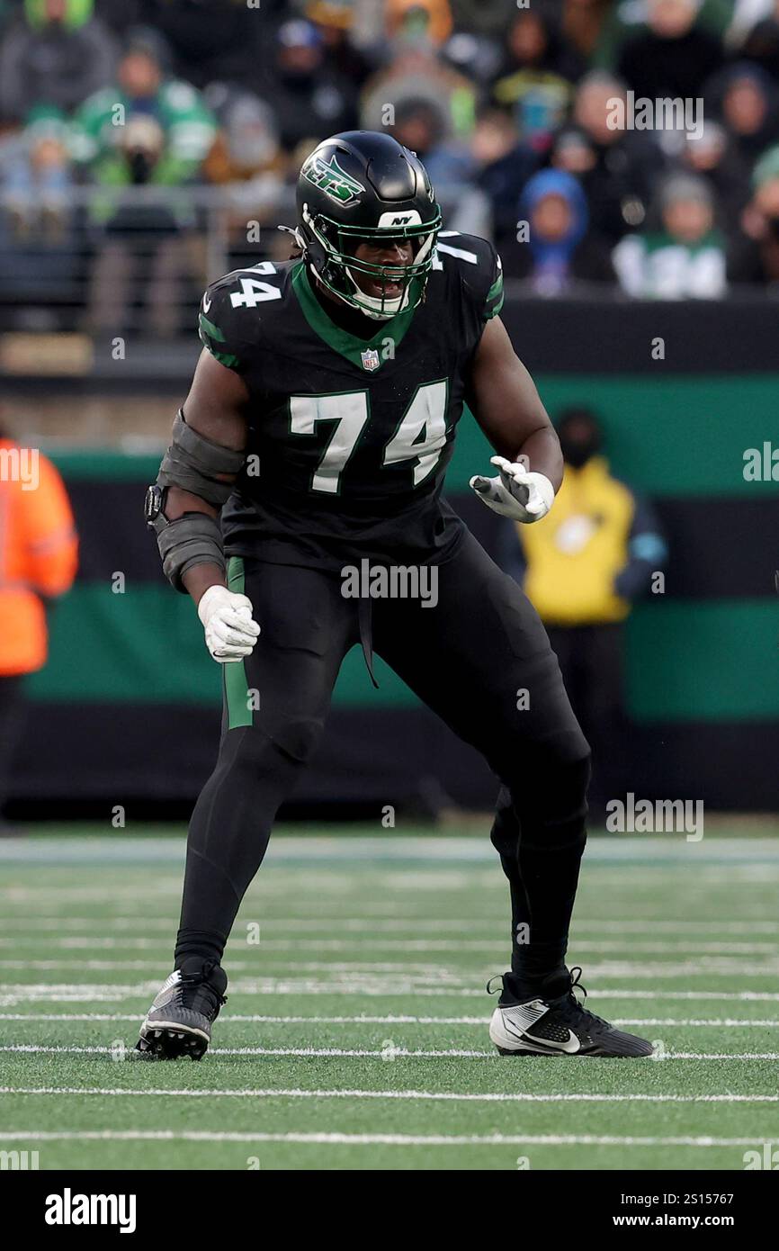 New York Jets offensive tackle Olu Fashanu (74) in action against the ...