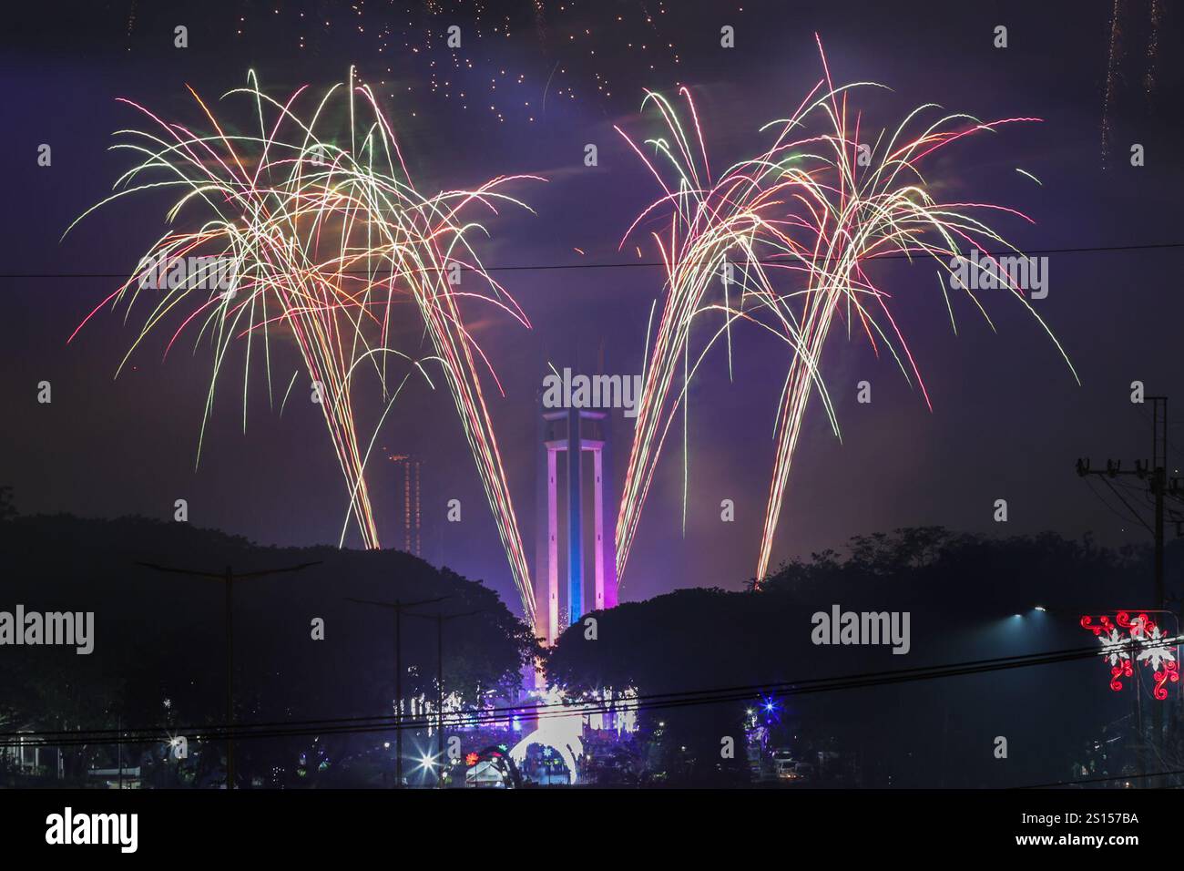 Quezon City, Philippines. 31st Dec, 2024. Fireworks explode to ...