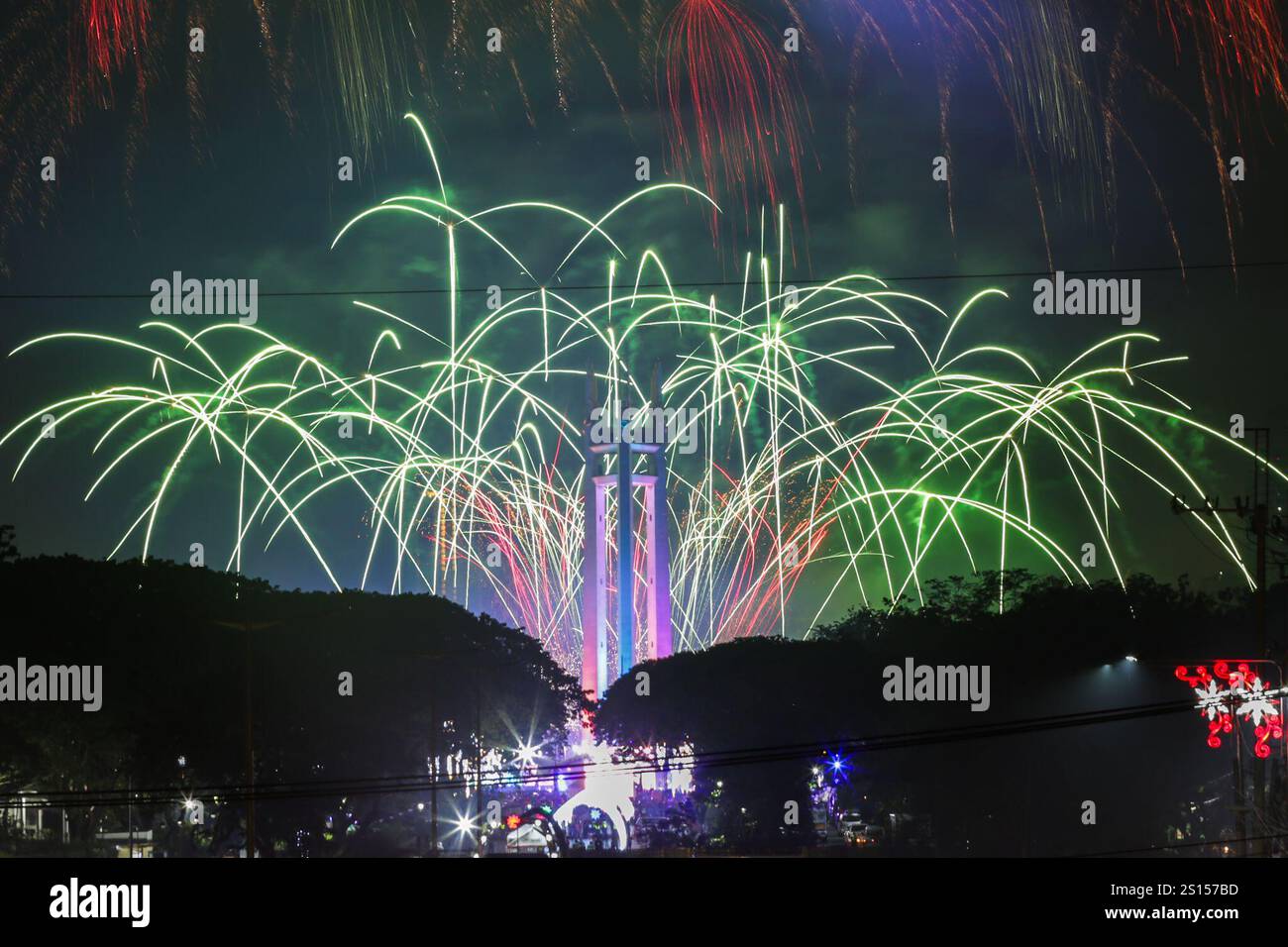 Quezon City, Philippines. 31st Dec, 2024. Fireworks explode to ...