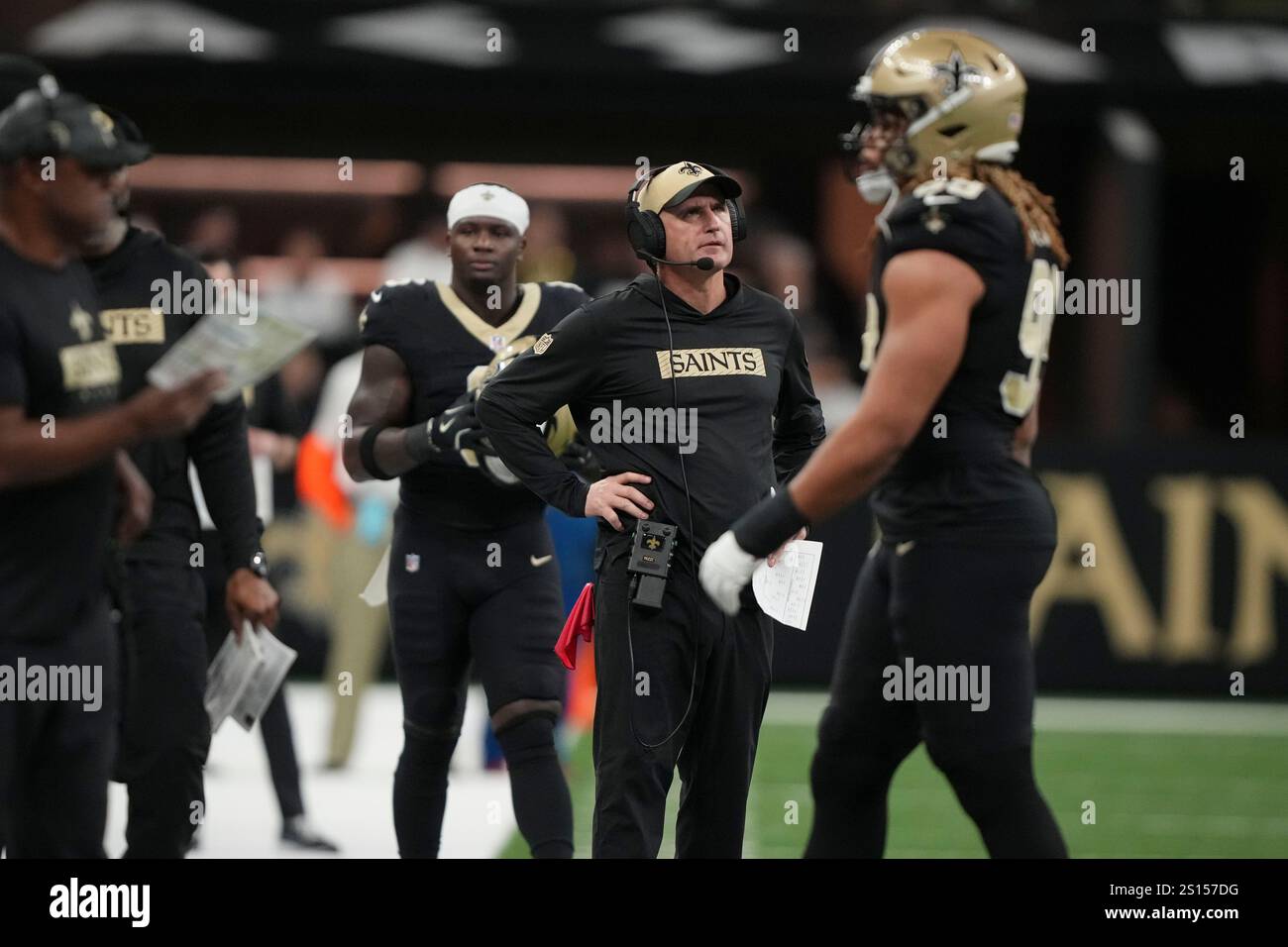 New Orleans Saints interim head coach Darren Rizzi watches from the ...