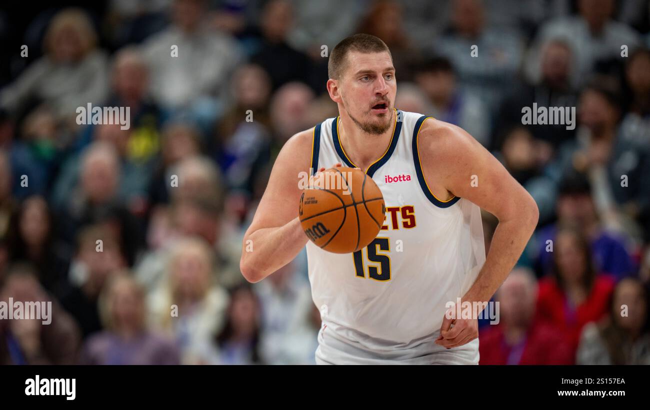 Denver Nuggets center Nikola Jokic brings the ball up court, during the ...