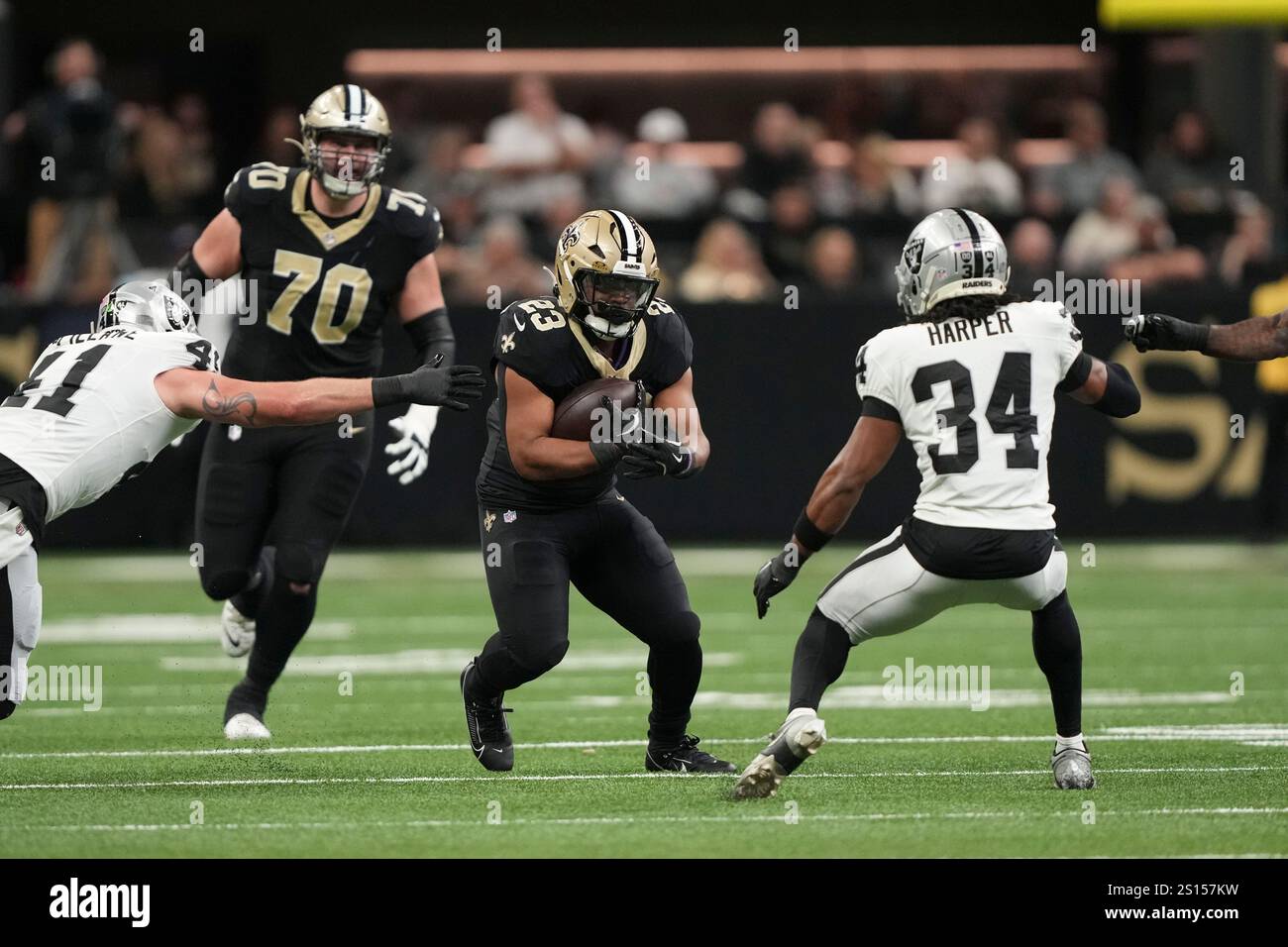 New Orleans Saints running back Clyde Edwards-Helaire (23) carries in ...