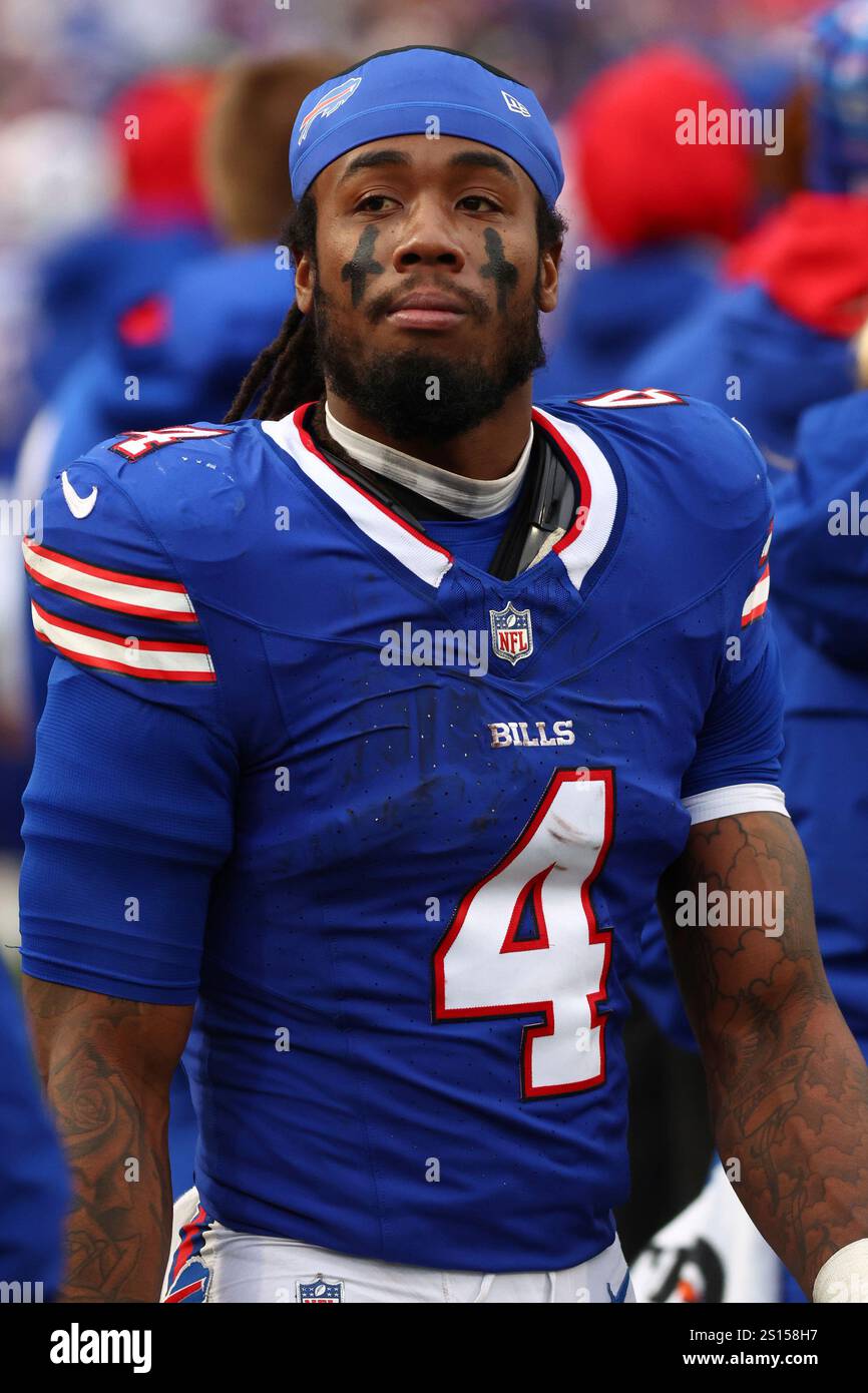Buffalo Bills running back James Cook (4) looks on during the second ...