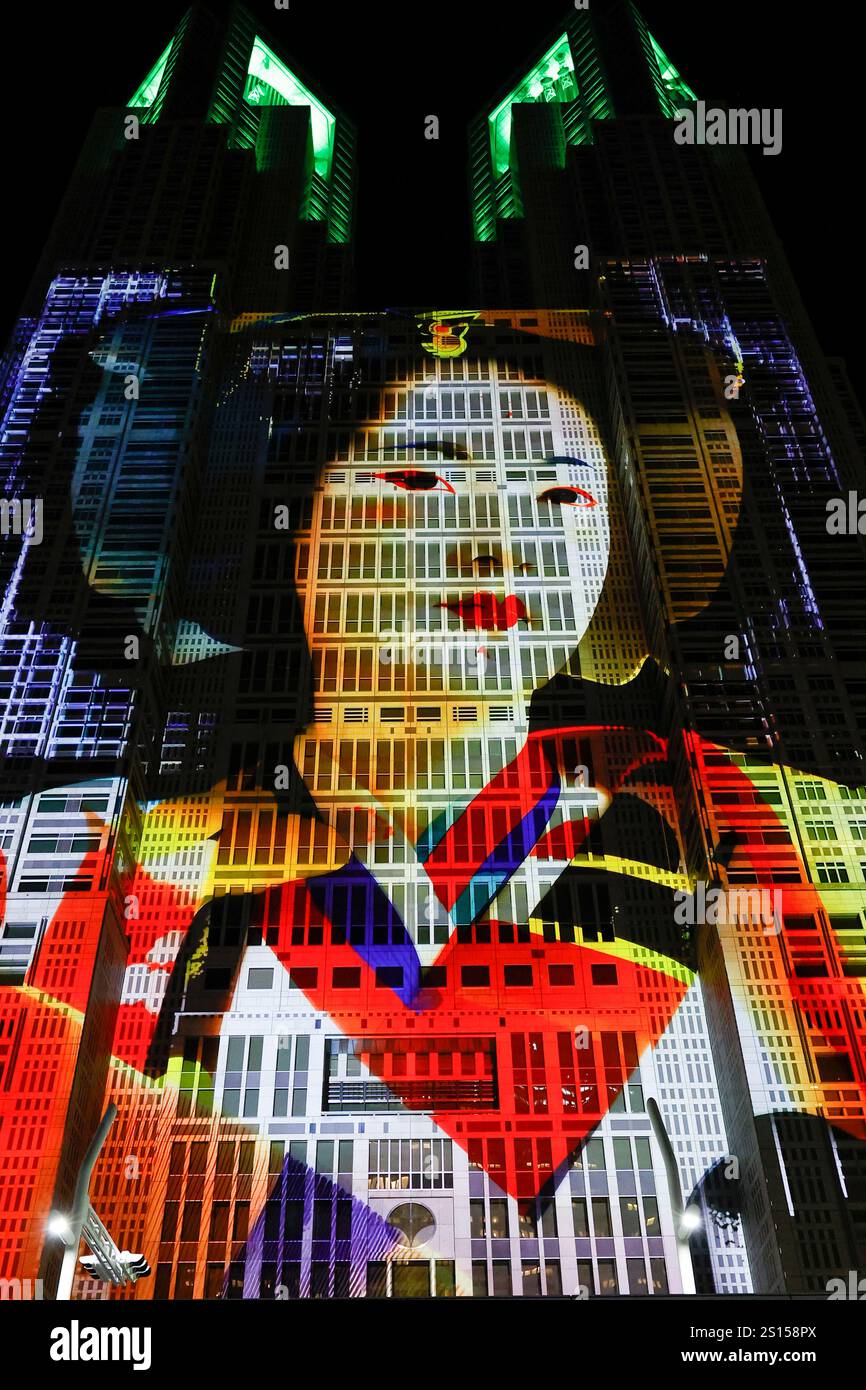 Tokyo, Japan. 31st Dec, 2024. A projection of a geisha is displayed on ...