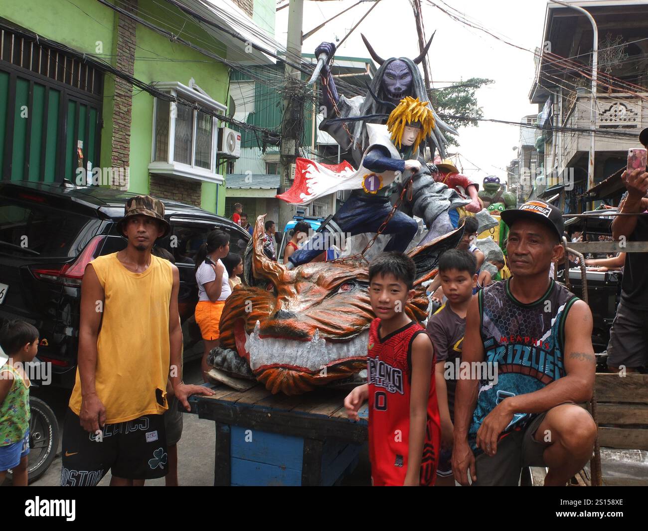 Malabon, Philippines. 31st Dec, 2024. A horned and a blond hair hero ...