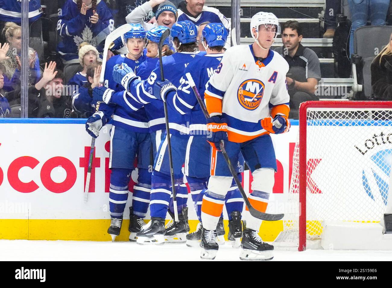 Toronto Maple Leafs David Kampf (left) is congratulated by teammates ...