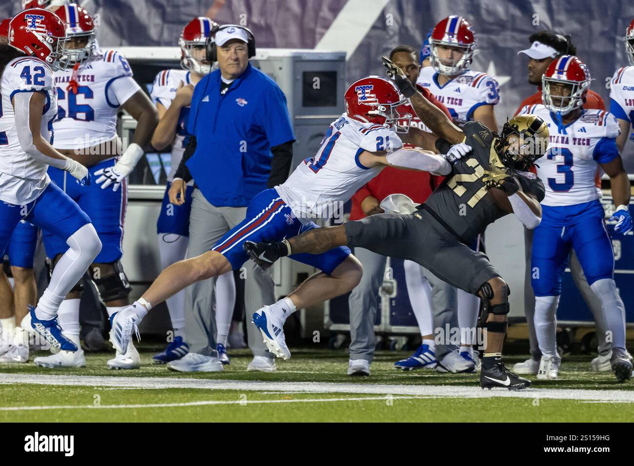 Army Black Knights running back Tyrell Robinson (21) is pushed out of ...