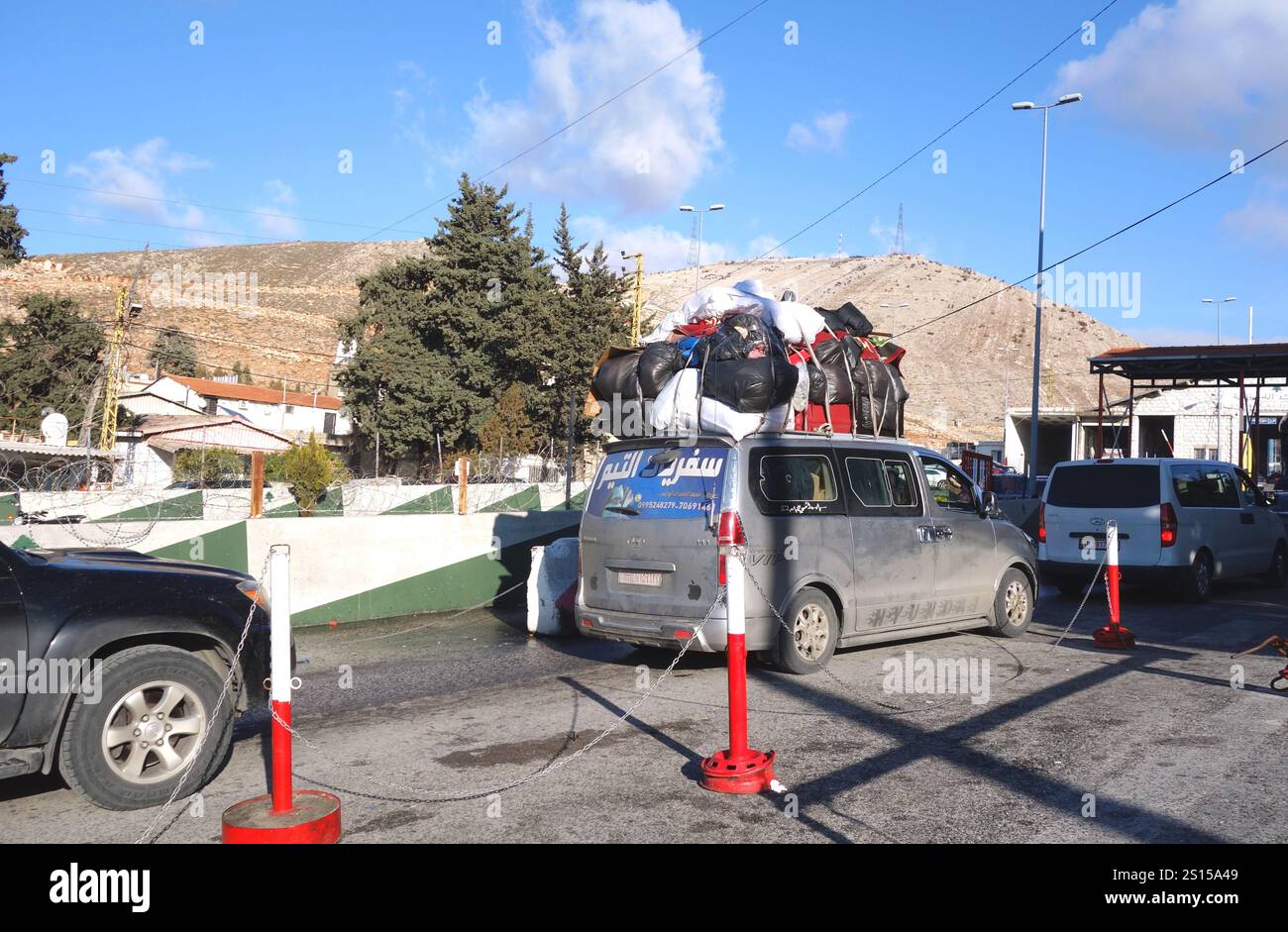 Cars queue at Masnaa crossing point on the Syrian border, Lebanon ...