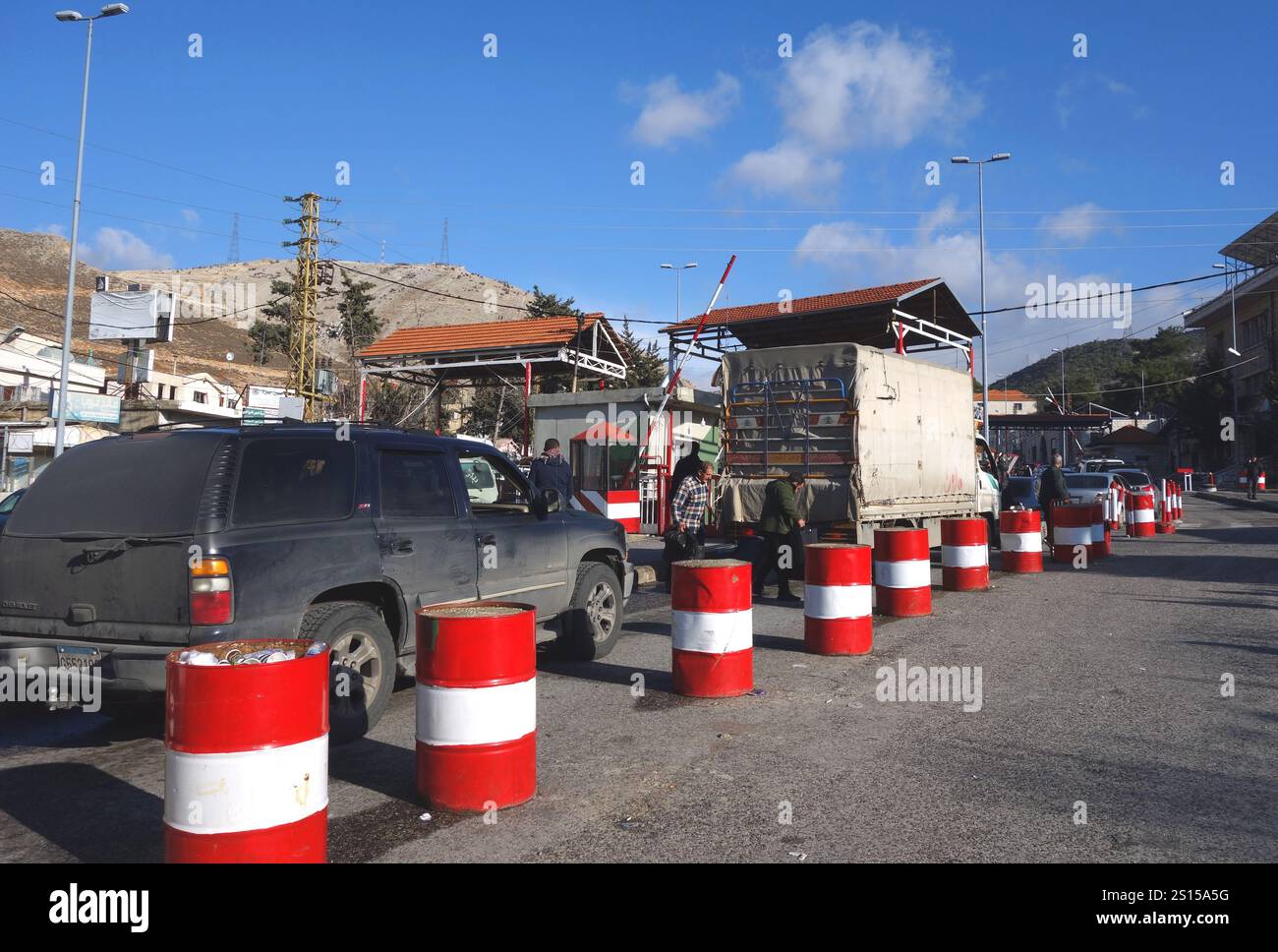 Cars queue at Masnaa crossing point on the Syrian border, Lebanon ...
