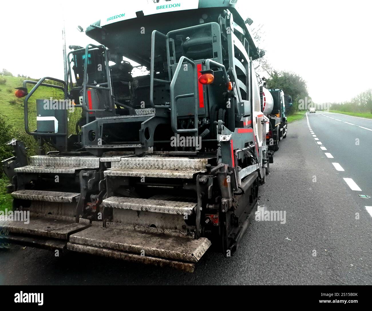 Road repair vehicles on the A75, Scotland Stock Photo - Alamy