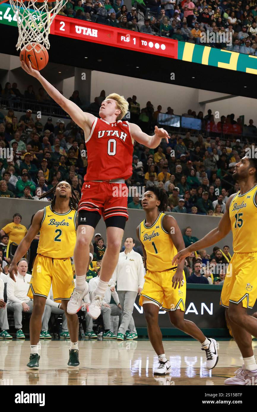 Utah guard Hunter Erickson scores against Baylor guards Jayden Nunn ...