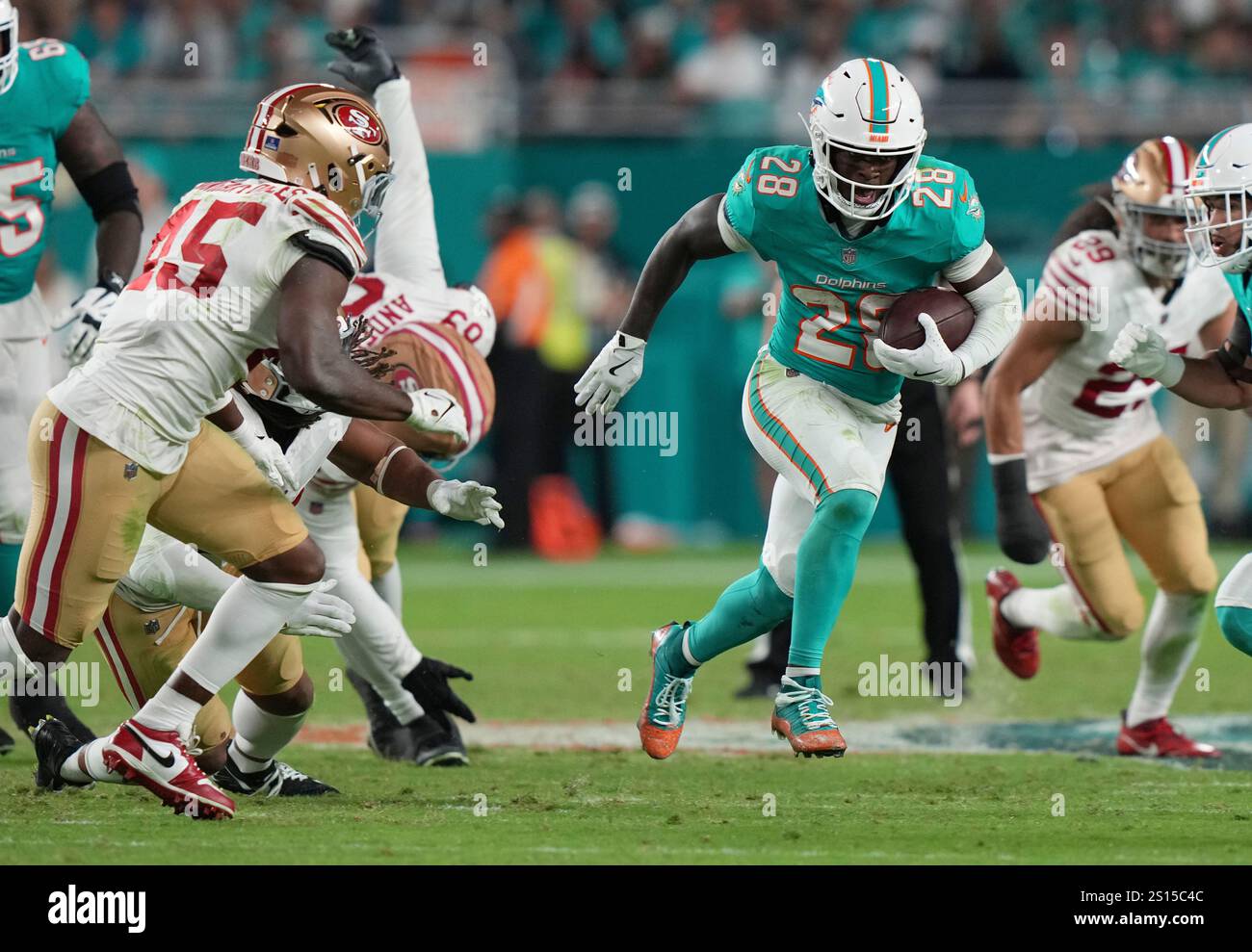 Miami Dolphins running back De'Von Achane (28) runs during the second ...
