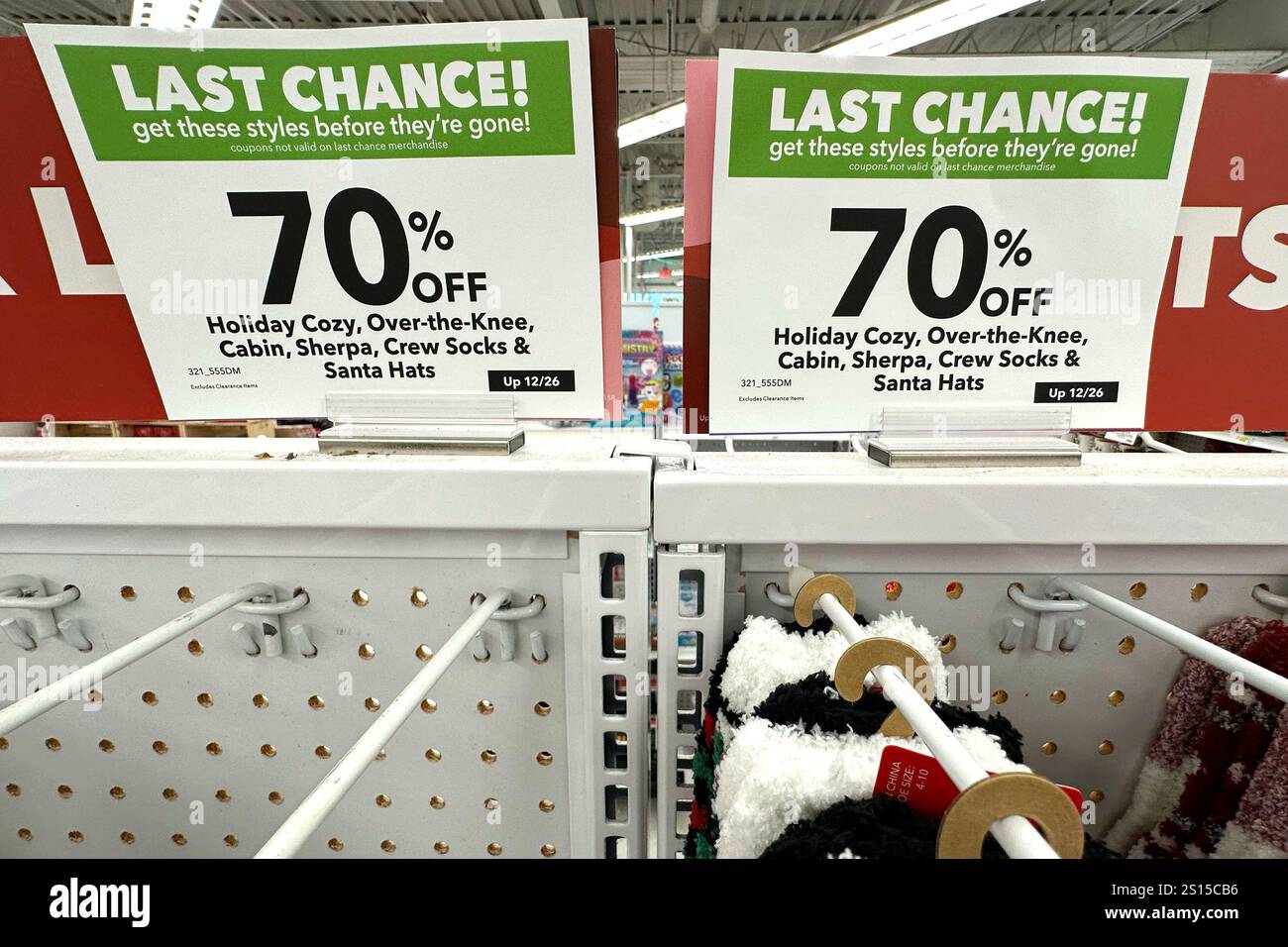 Last chance sale signs are displayed at a retail store in Arlington ...