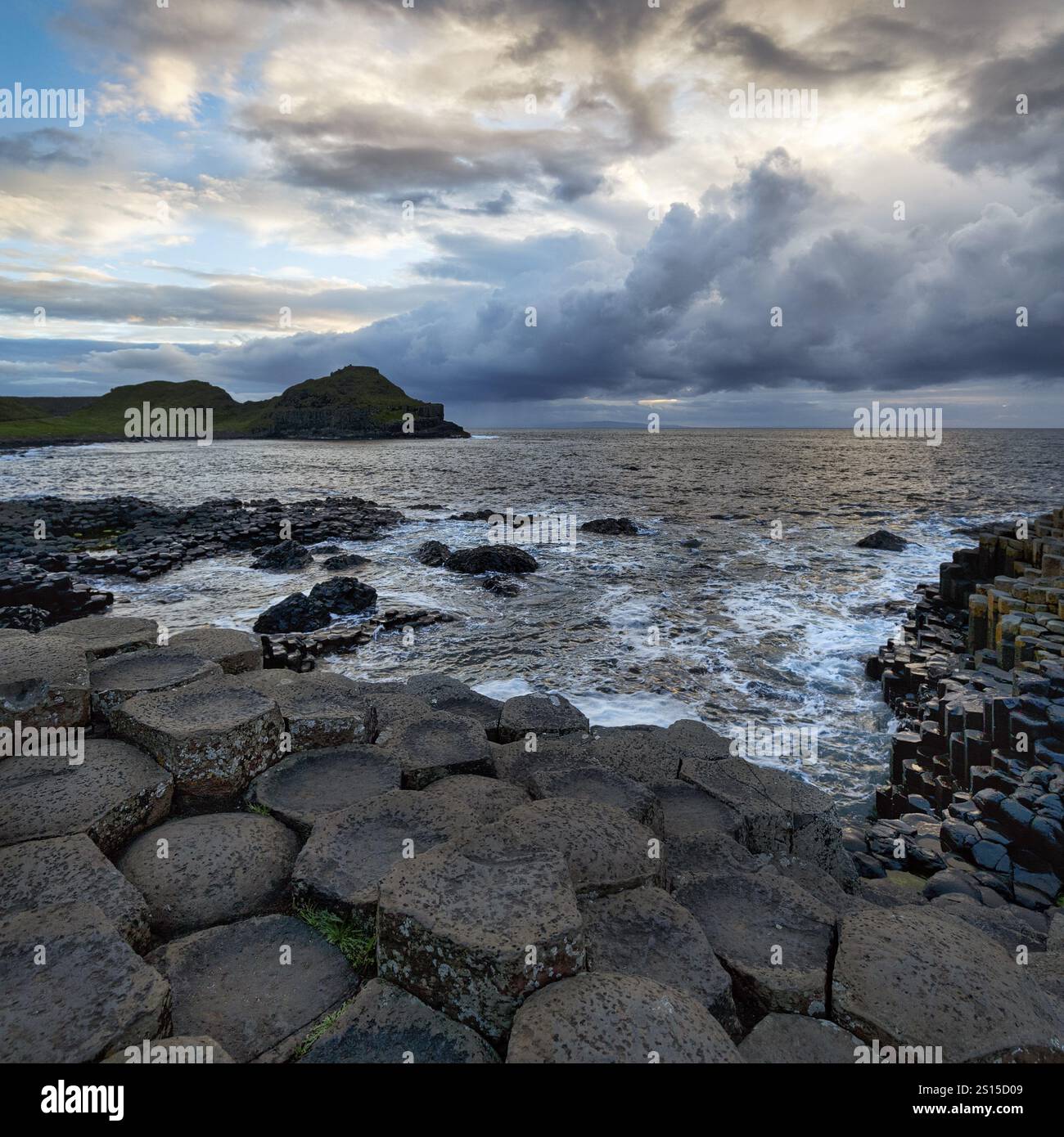 Rocky coast with basalt columns, coastline, dusk by the sea, Giant's ...