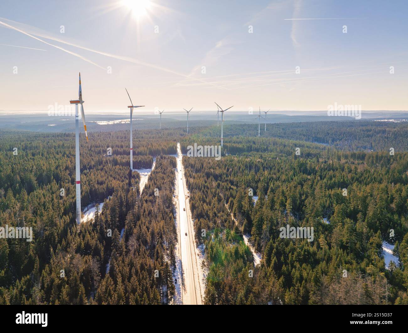 Wind turbines stretch across a forest to the horizon, Seewald, Black ...