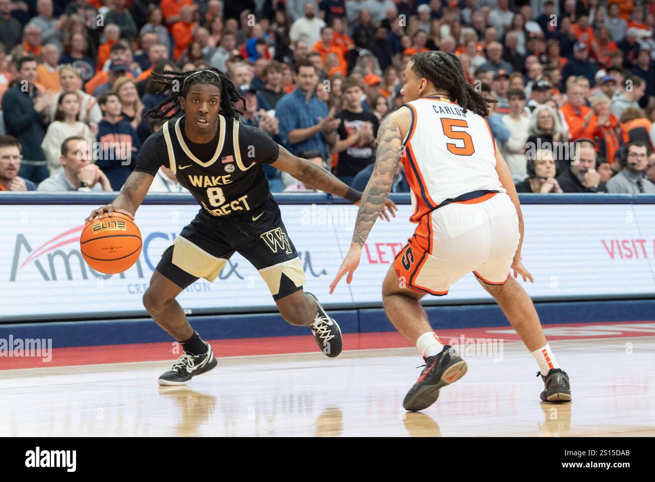 SYRACUSE, NY - DECEMBER 31: Wake Forest Demon Deacons Guard Ty-Laur ...
