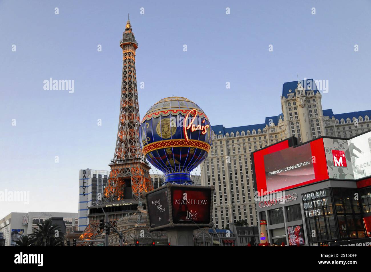 Las Vegas, Nevada, USA, North America, A colourful balloon and the Eiffel Tower in a busy ...