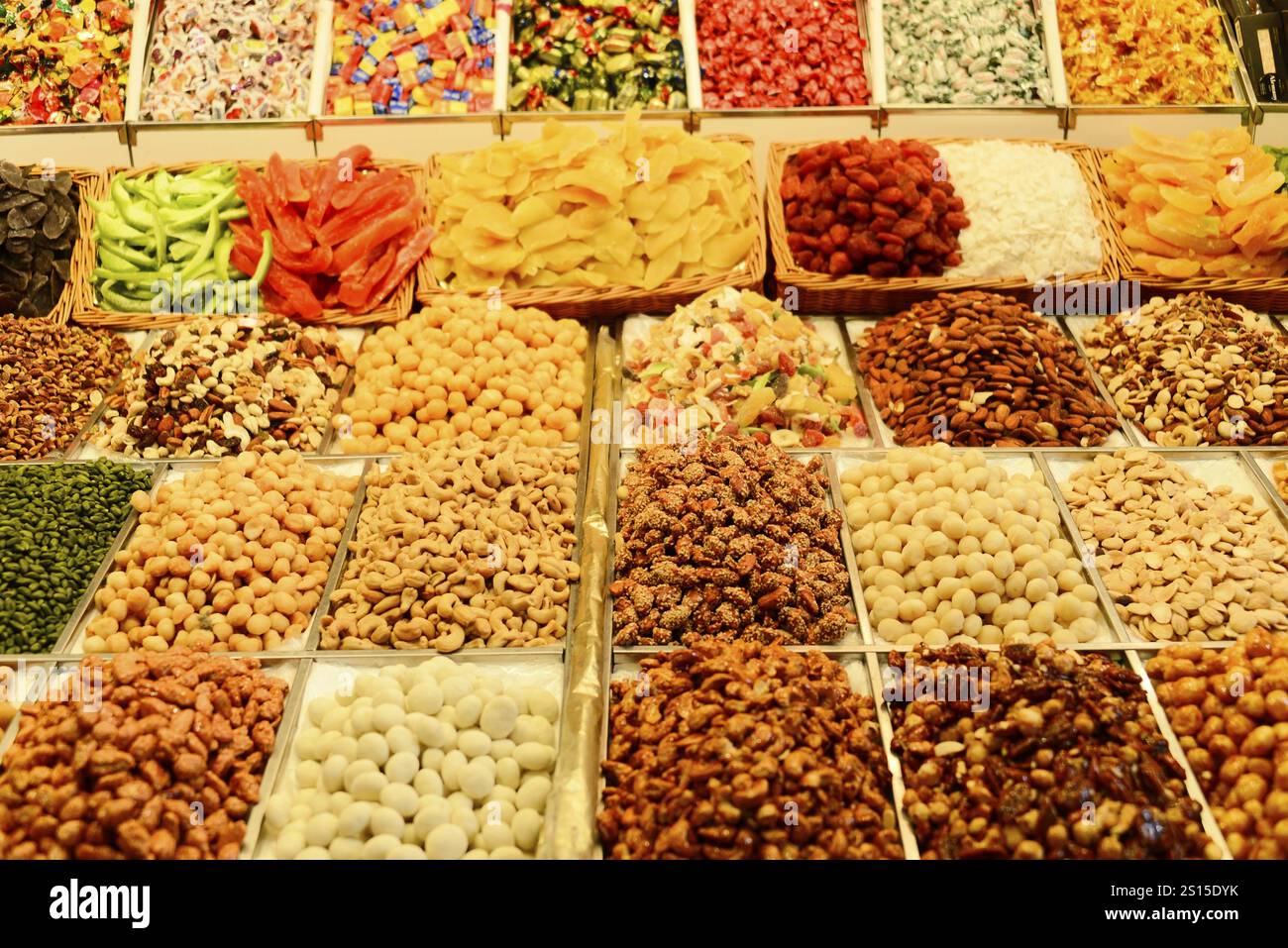 Different types of dried fruit and nuts, colourfully arranged on a ...