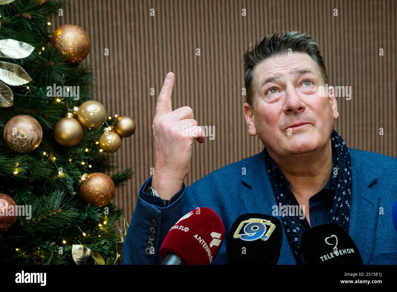 Trani, Italy. 31st Dec, 2024. Tony Hadley (C) speaks during a press ...