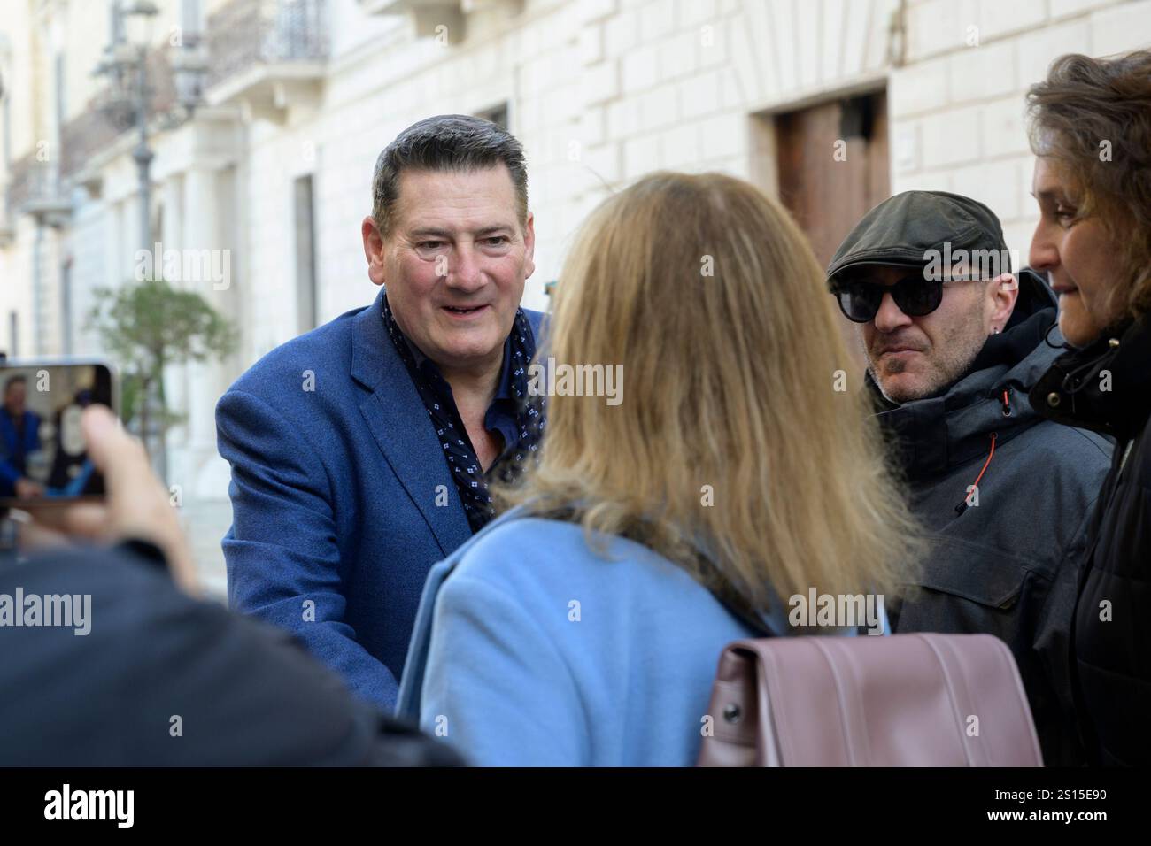 Tony Hadley (R) seen greeting a fan. A musical icon, singer Tony Hadley ...