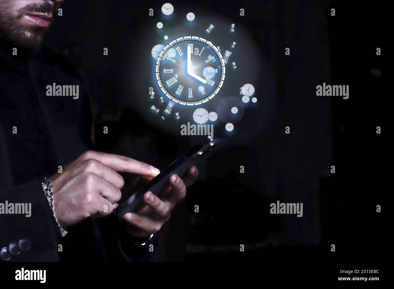 Image of a man using his mobile phone with a digital graphic of a clock ...