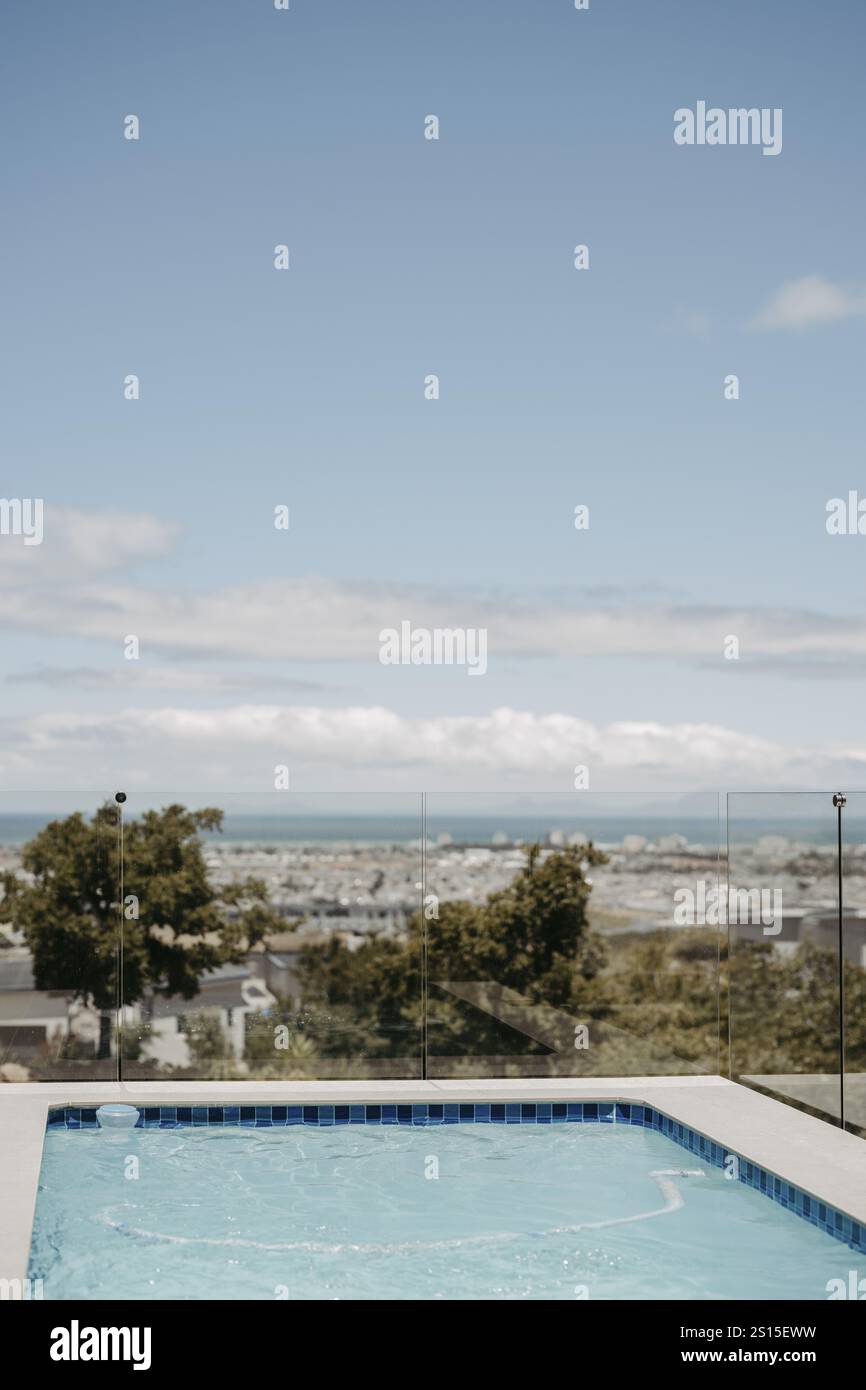 Swimming pool on the terrace with sea view Stock Photo - Alamy