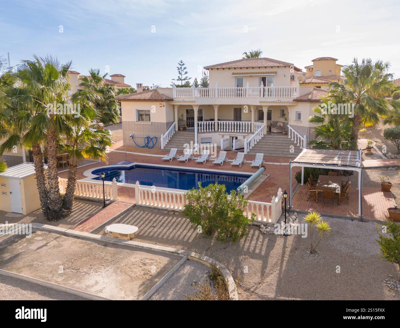 Mediterranean-style villa offering a large pool, multiple terraces ...