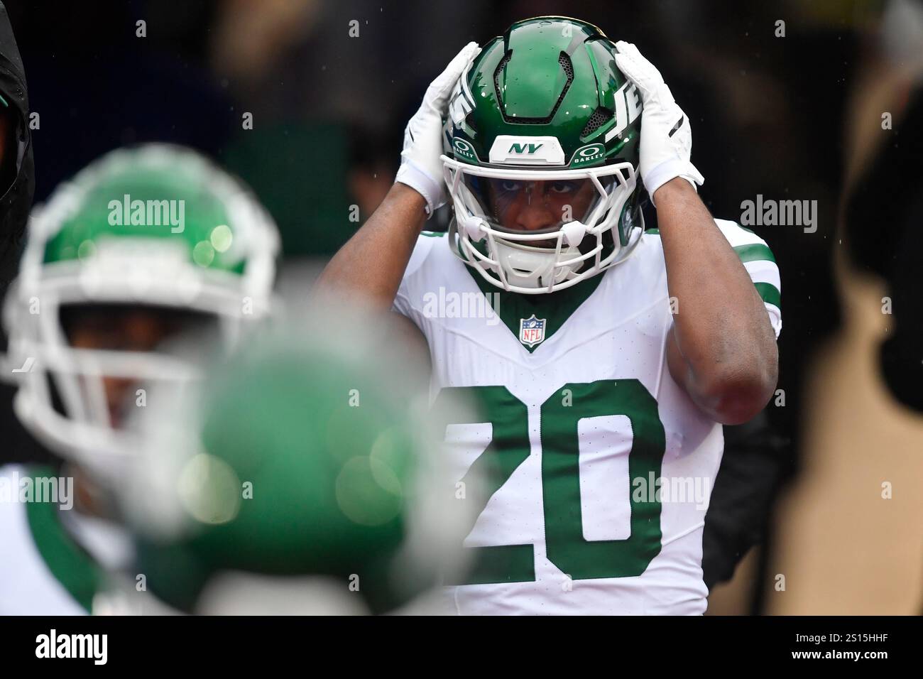 New York Jets running back Breece Hall (20) walks to the field before ...