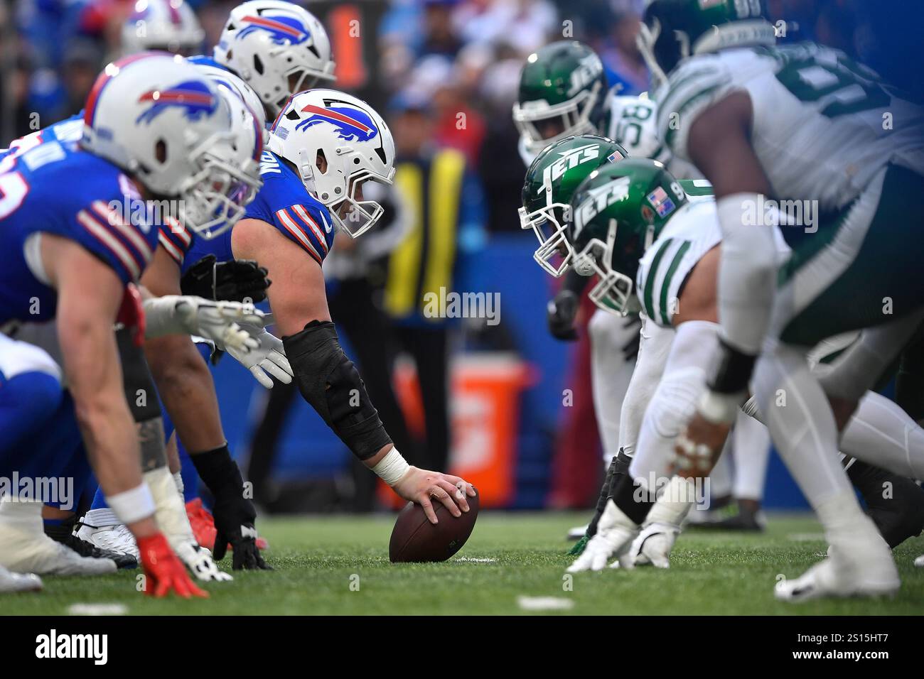 The Buffalo Bills and the New York Jets line up at the line of ...