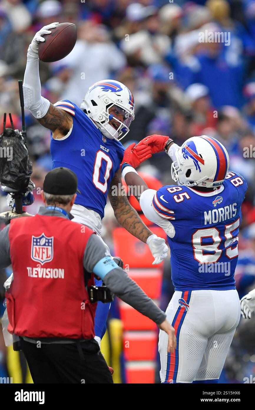 Buffalo Bills wide receiver Keon Coleman, left, celebrates with tight ...