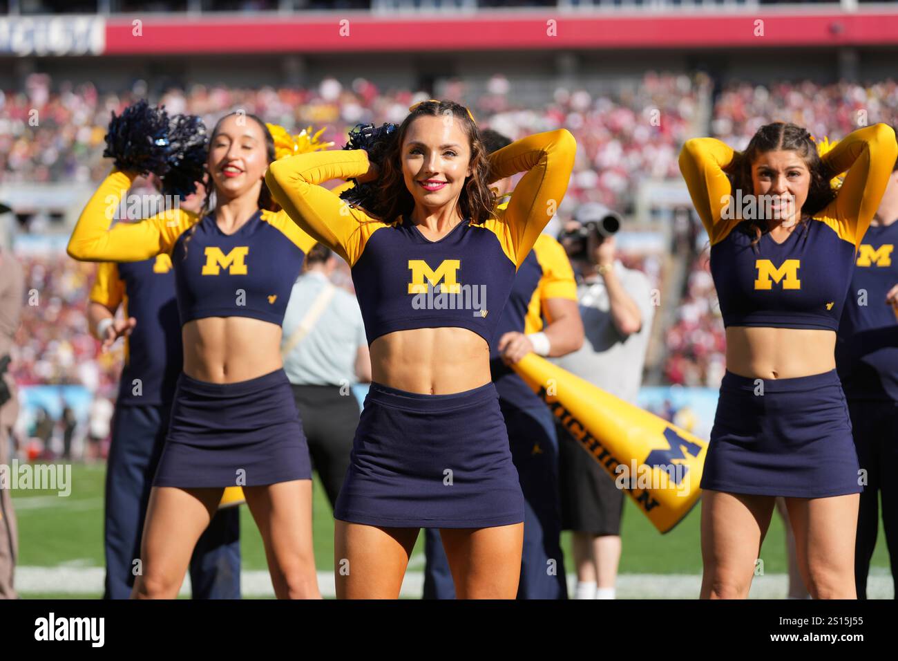 TAMPA, FL - DECEMBER 31: Michigan Wolverines cheerleaders performs for ...