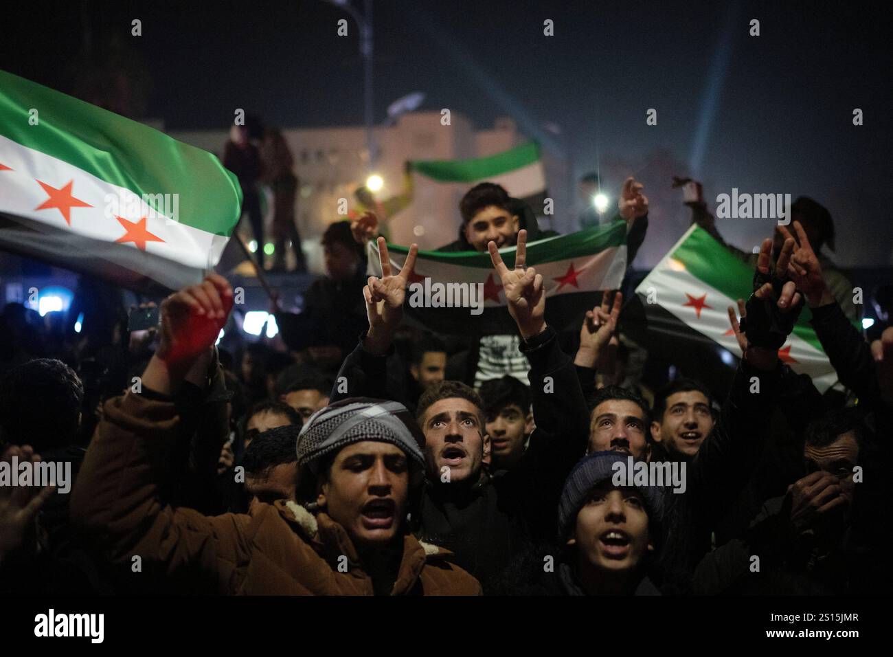 People celebrate during New Year's Eve festivities at Umayyad Square in ...