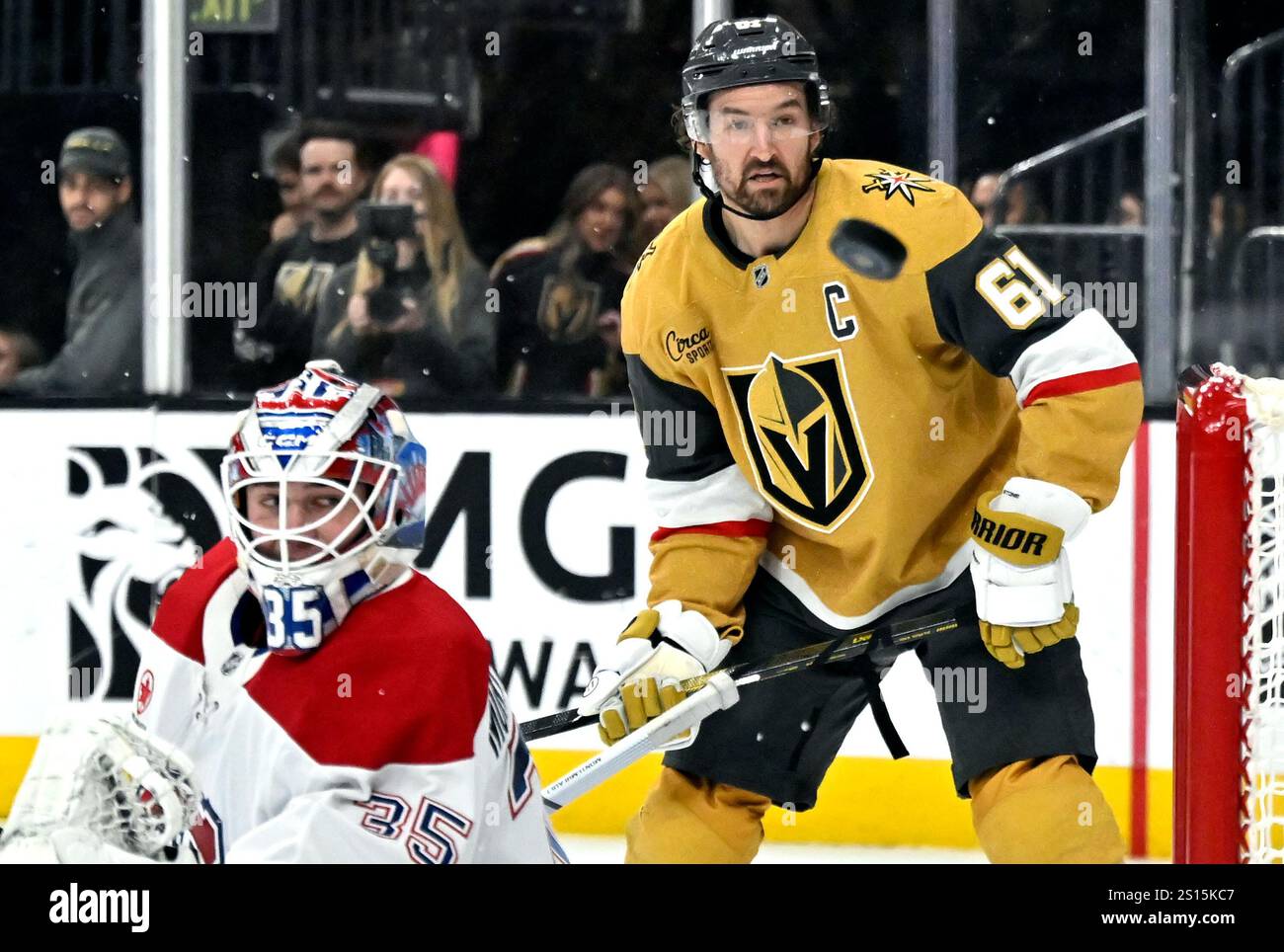 Vegas Golden Knights right wing Mark Stone (61) watches the puck fly by ...