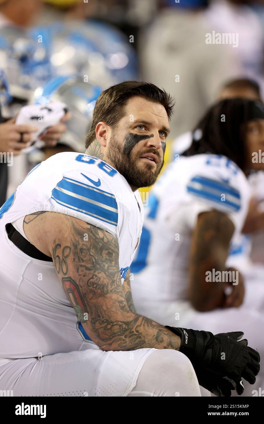 Detroit Lions offensive tackle Taylor Decker (68) sits on the sideline ...