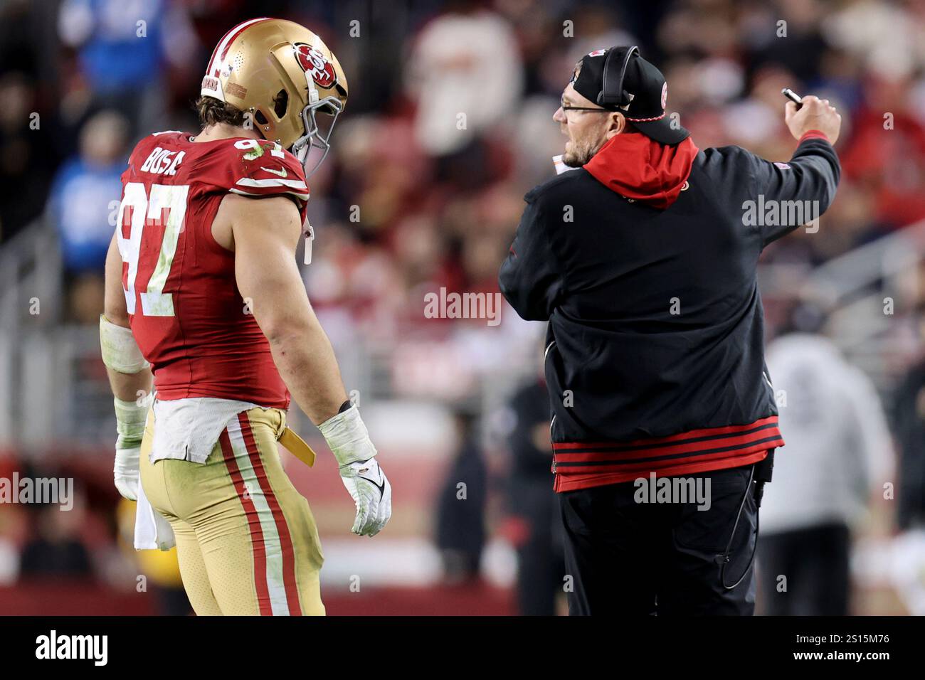 San Francisco 49ers defensive line coach Kris Kocurek talks with ...