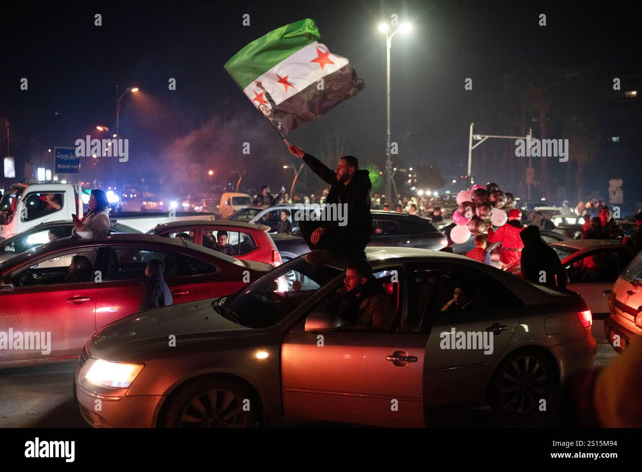 People celebrate on New Year's Eve at Umayyad Square in Damascus, Syria ...