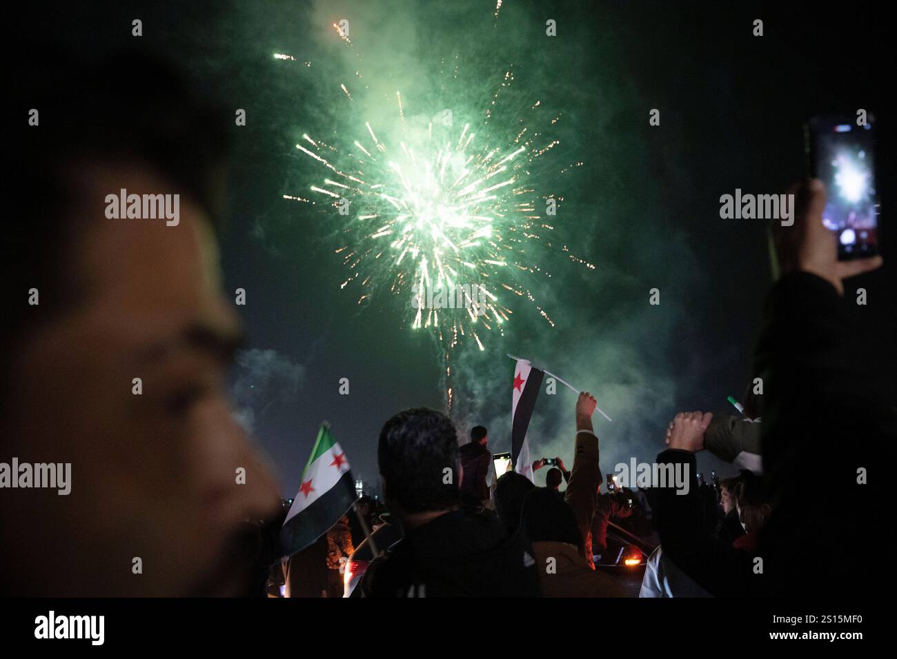 People celebrate on New Year's Eve at Umayyad Square in Damascus, Syria ...
