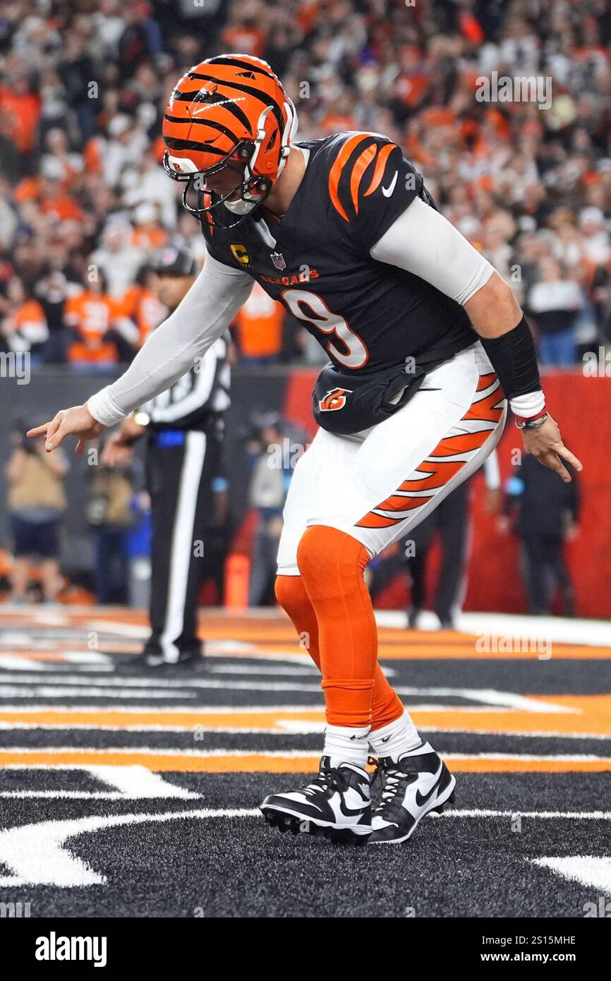 Cincinnati Bengals quarterback Joe Burrow celebrates a touchdown with a ...