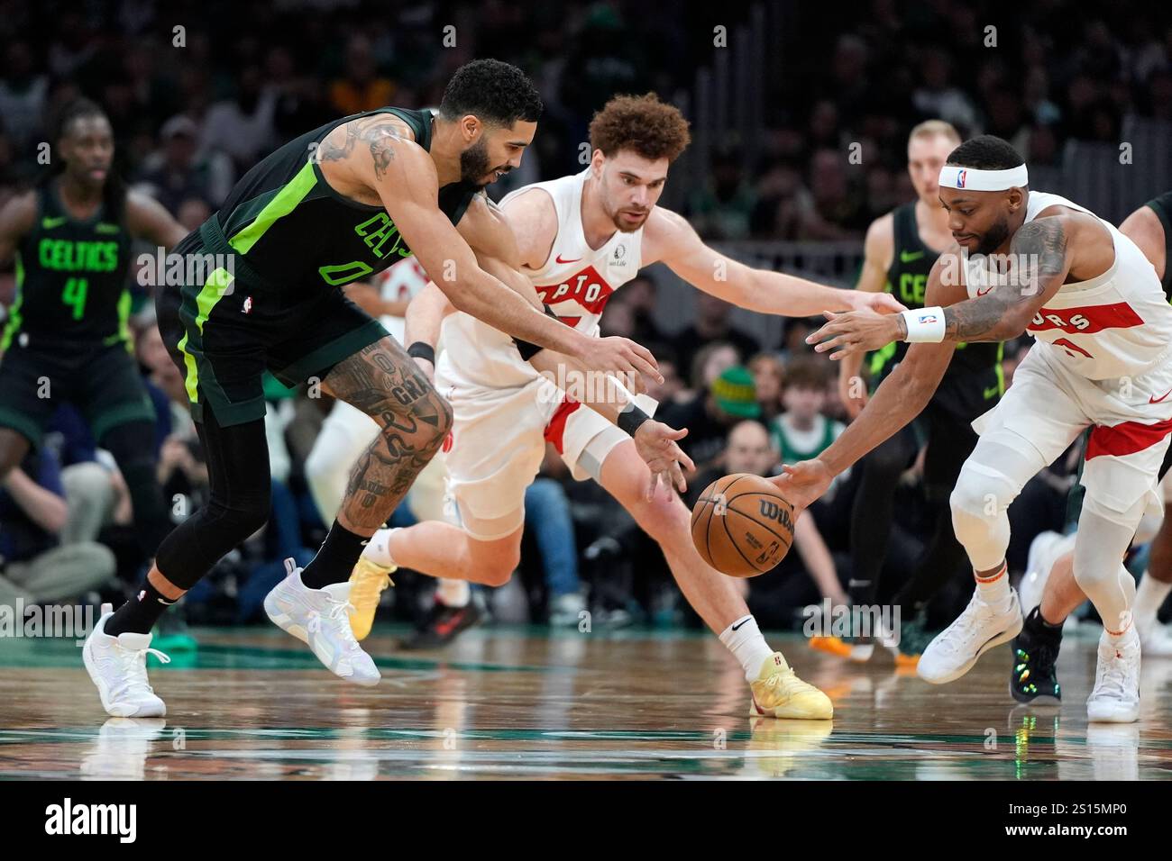 Boston Celtics' Jayson Tatum (0) battles Toronto Raptors' Jamison ...