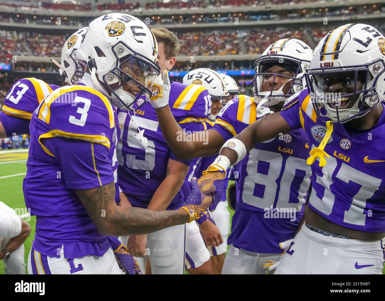 HOUSTON, TX - DECEMBER 31: LSU Tigers wide receiver Chris Hilton Jr. (3) is congratulated by ...