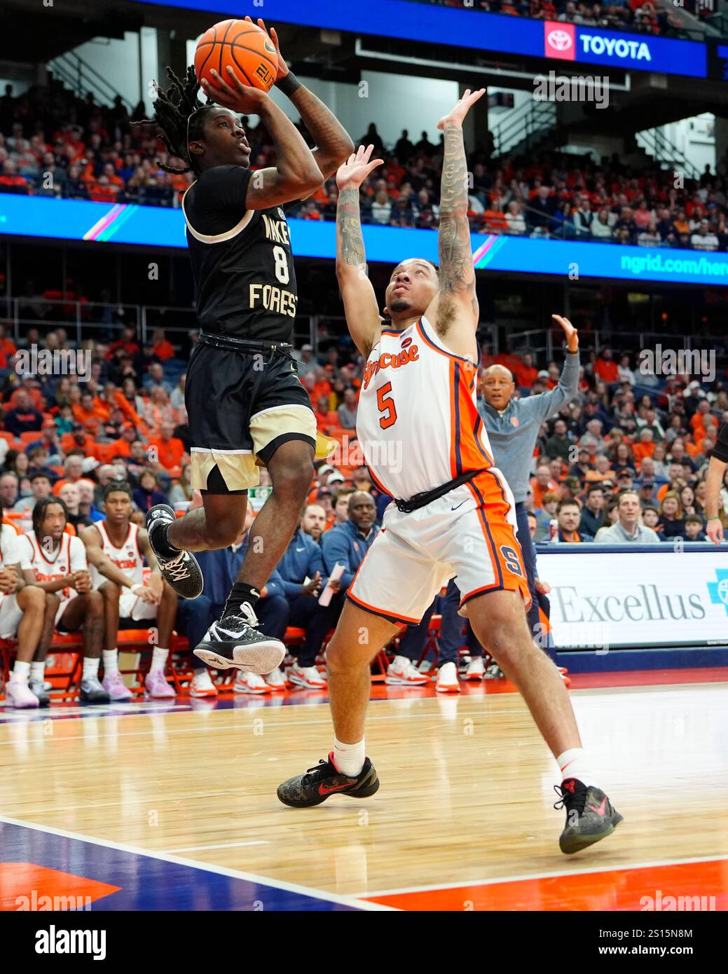 SYRACUSE, NY - DECEMBER 31: Wake Forest Demon Deacons Guard Ty-Laur ...