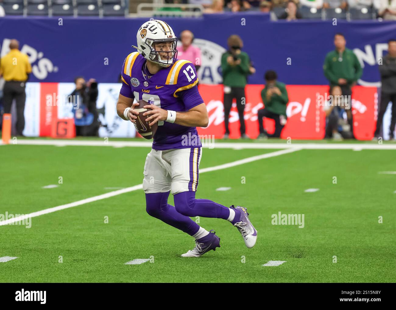 HOUSTON, TX - DECEMBER 31: LSU Tigers quarterback Garrett Nussmeier (13) looks for an open ...