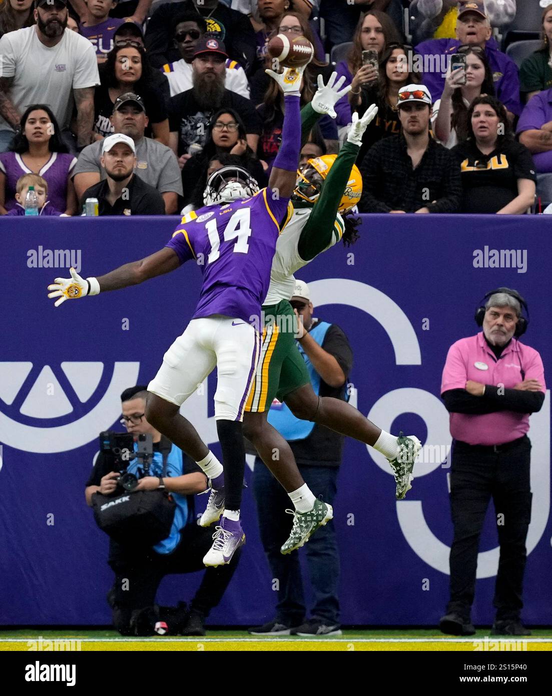LSU cornerback Zy Alexander (14) breaks up a pass intended for Baylor ...
