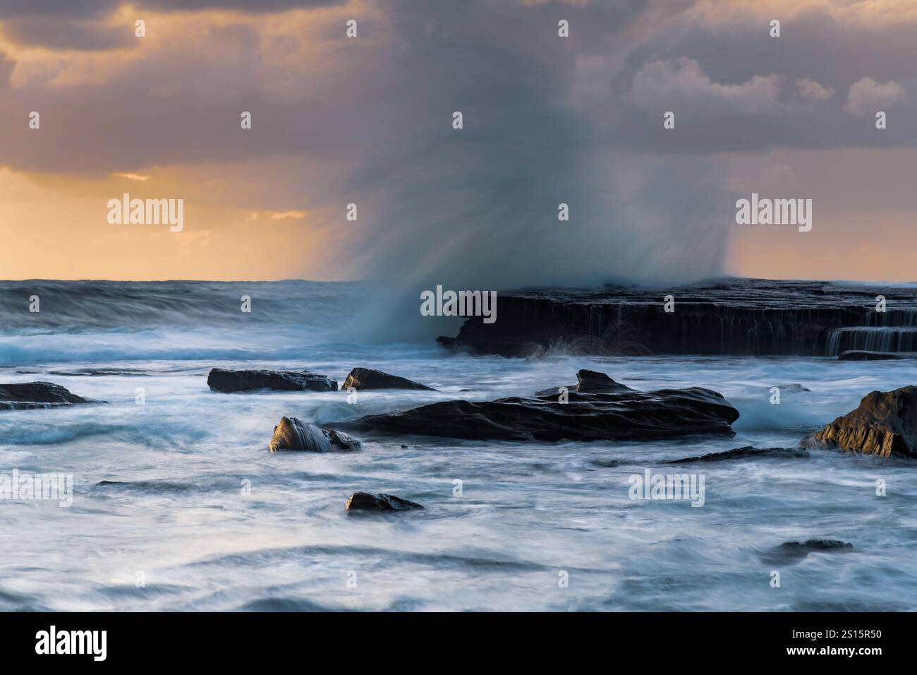 Autumn sunrise seascape with clouds and rocks at The Skillion in ...